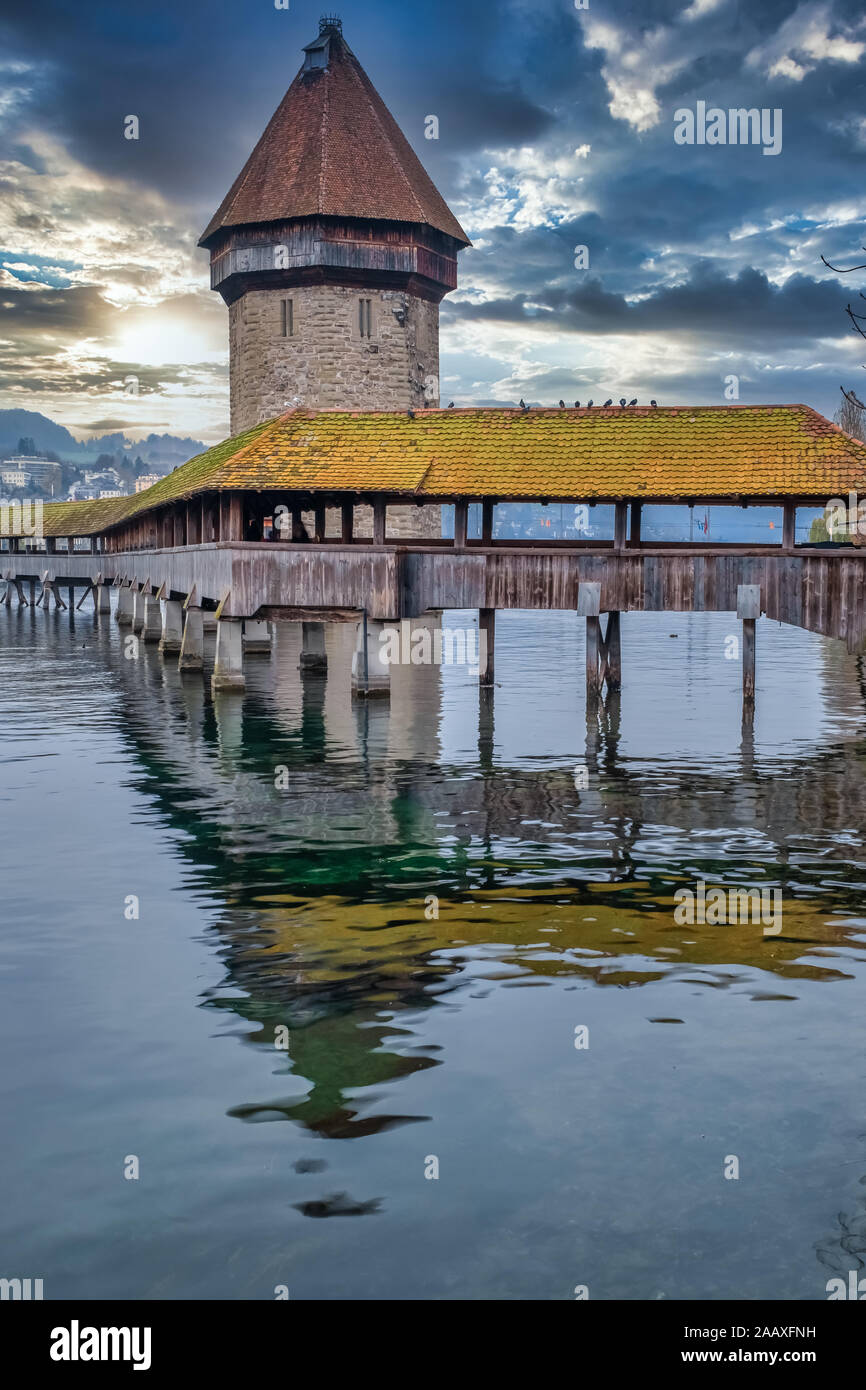 The Chapel Bridge (Kapellbrucke) a covered wooden truss footbridge ...