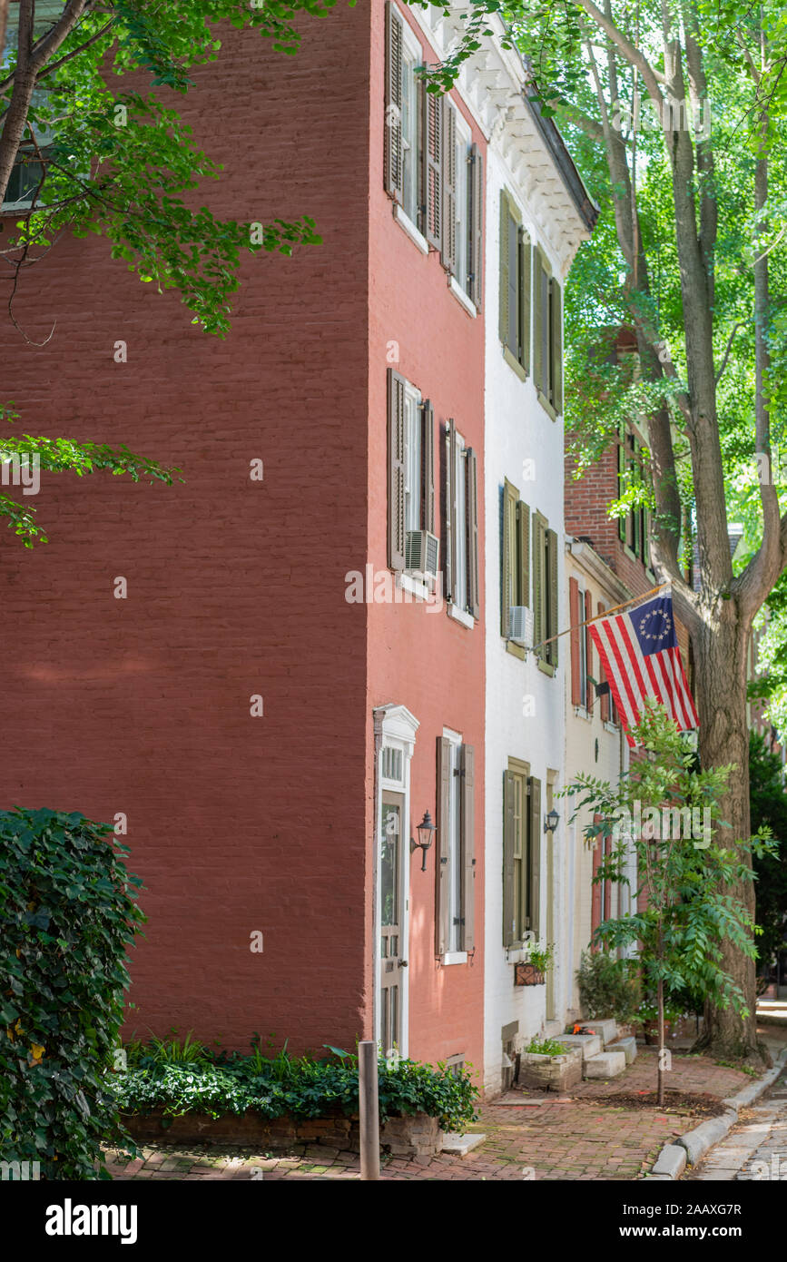 Historic buildings and tall trees line Quince St, one of Philadelphia's ...