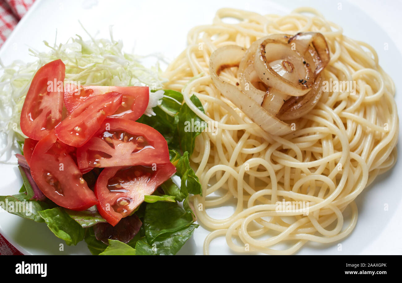 The homemade spaghetti dish serving in white plate Stock Photo - Alamy