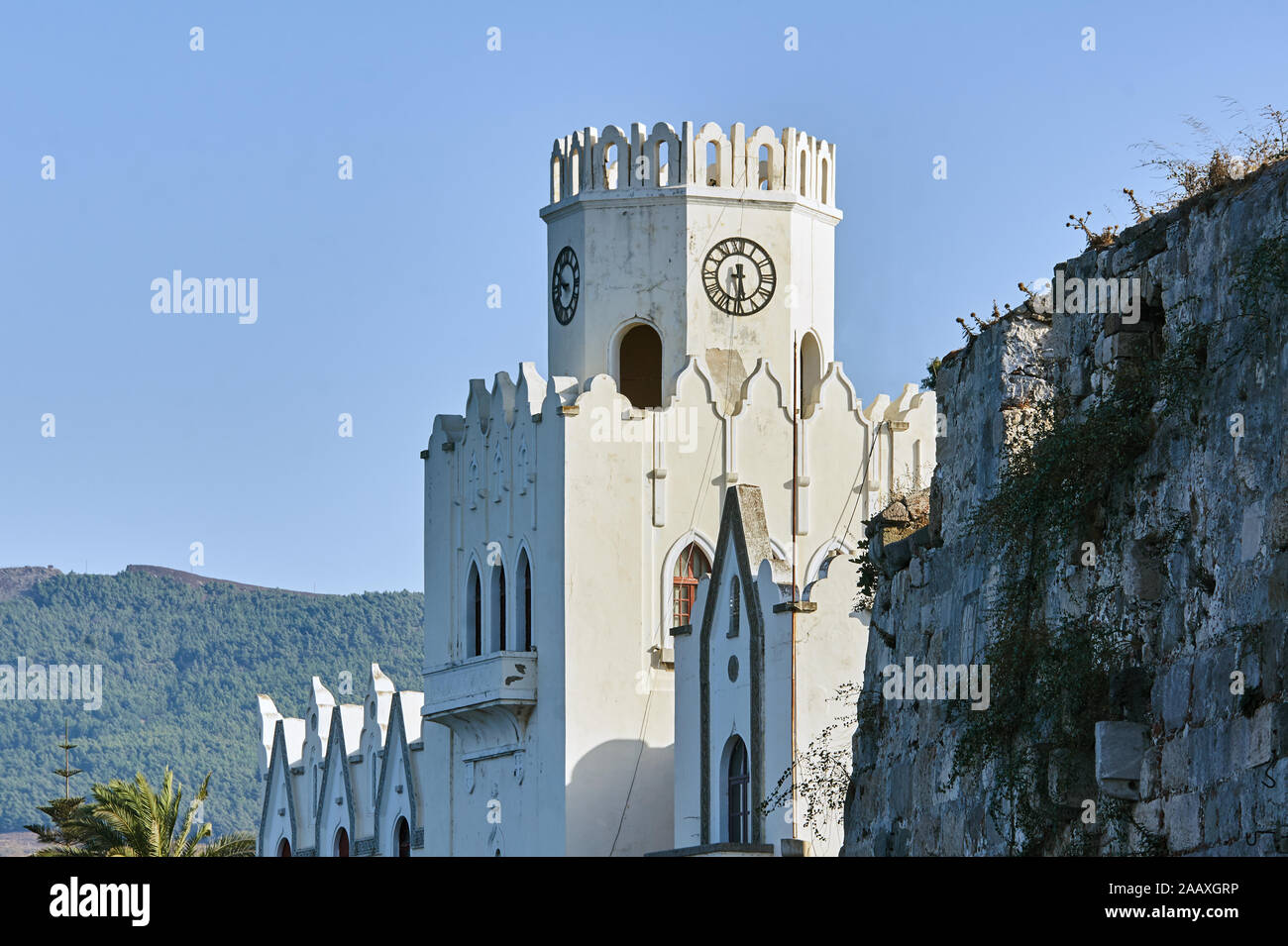 The historic buildings with tower in the port city of Kos on the island ...