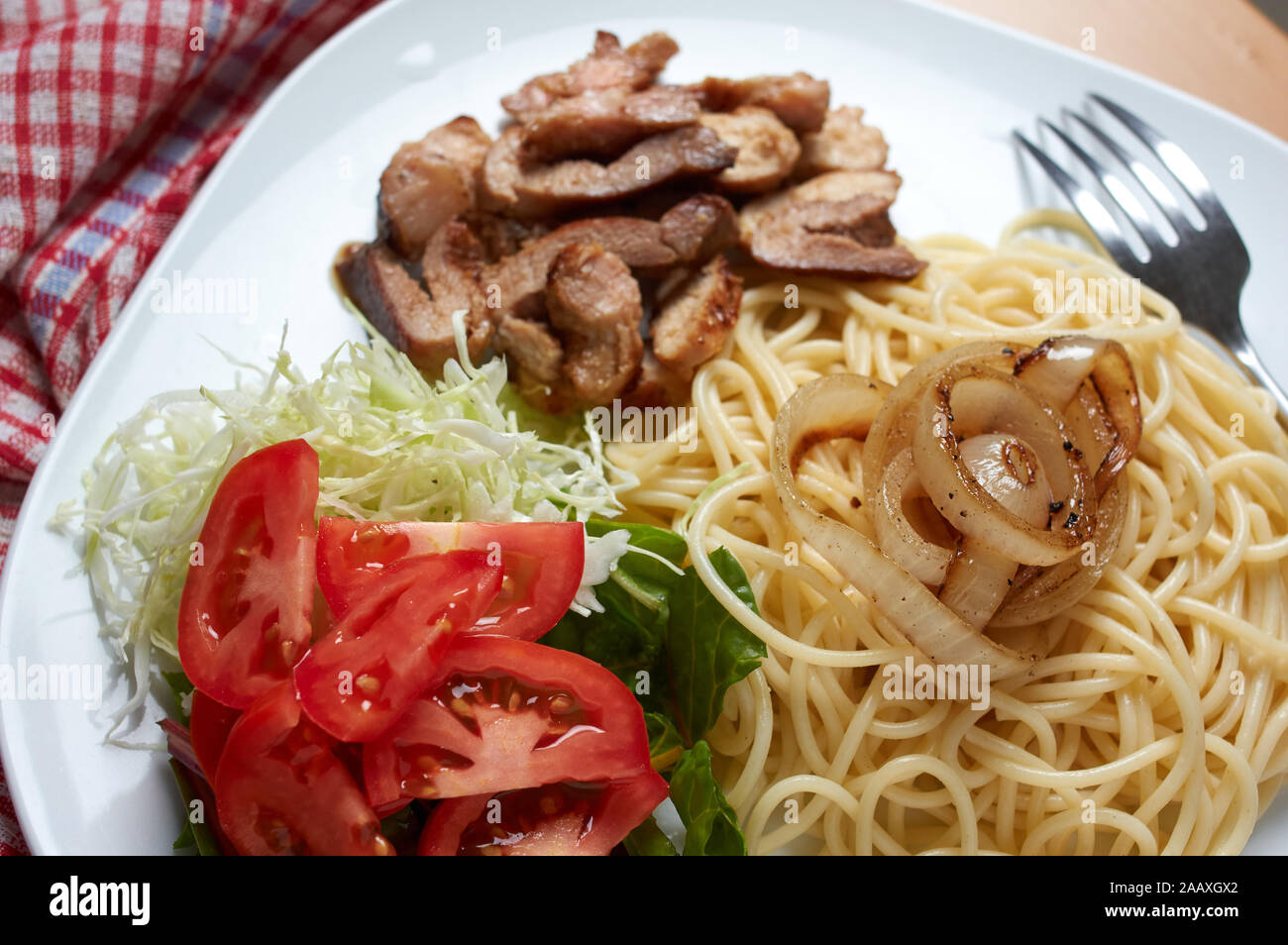 The homemade spaghetti dish serving in white plate Stock Photo - Alamy