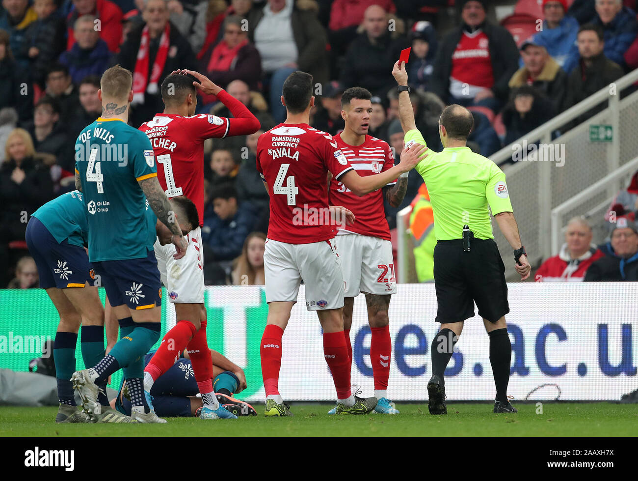 Middlesbrough's Marvin Johnson (21) is shown a red card by referee ...