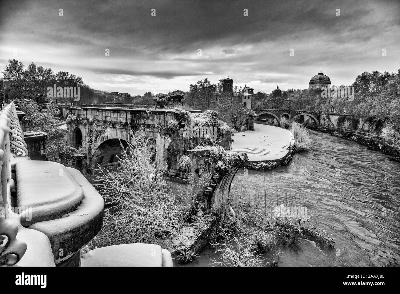 An old bridge in Rome and its island Stock Photo - Alamy