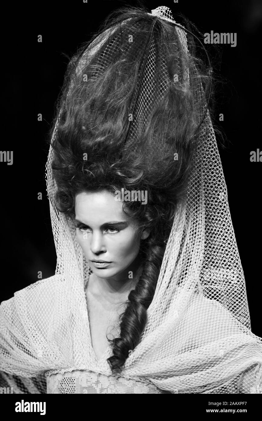 Fashion model with tall bee hive hairstyle. Marella Ferrera - AltaRoma ...