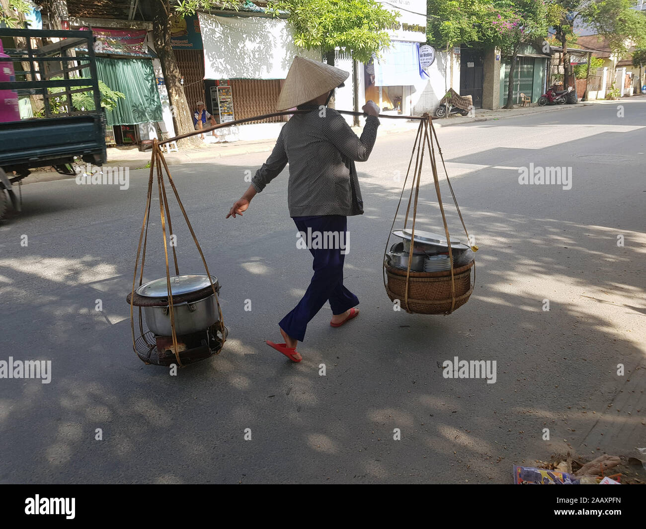 Shoulder poles hi-res stock photography and images - Alamy