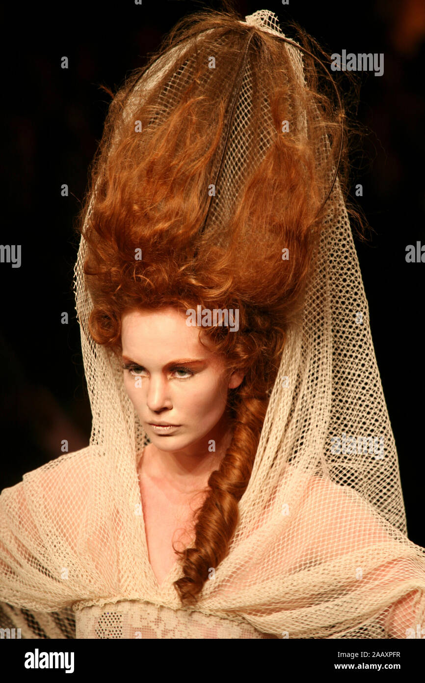 Fashion model with tall bee hive hairstyle. Marella Ferrera - AltaRoma ...