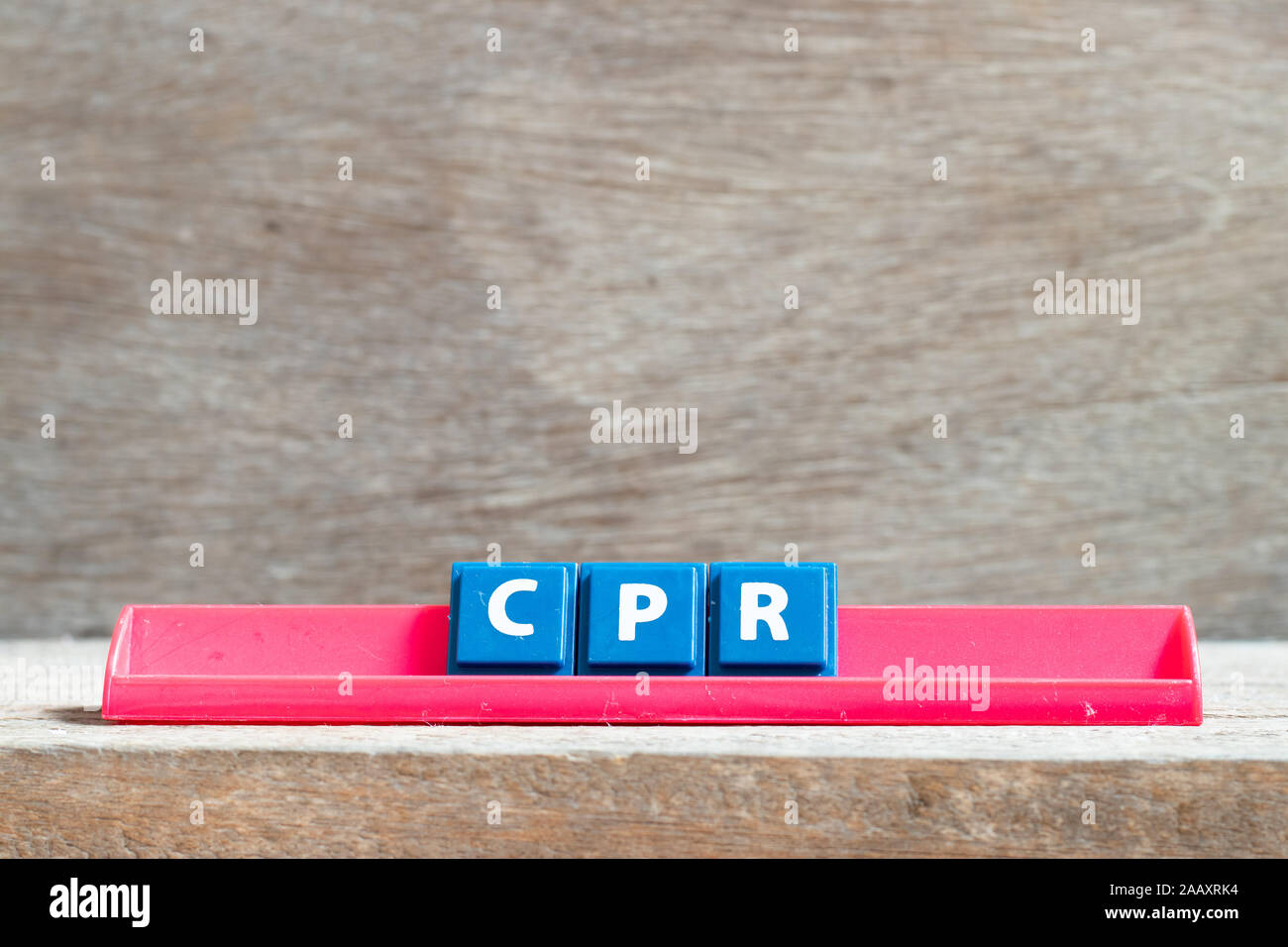 Tile letter on red rack in word CPR (abbreviation of Cardiopulmonary ...
