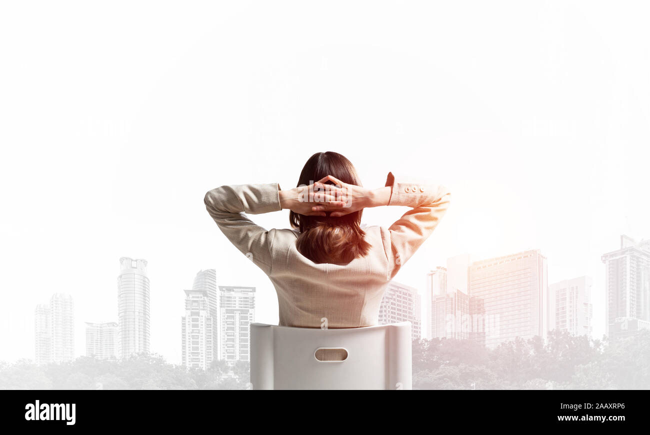 Holding hands behind head hi-res stock photography and images - Alamy