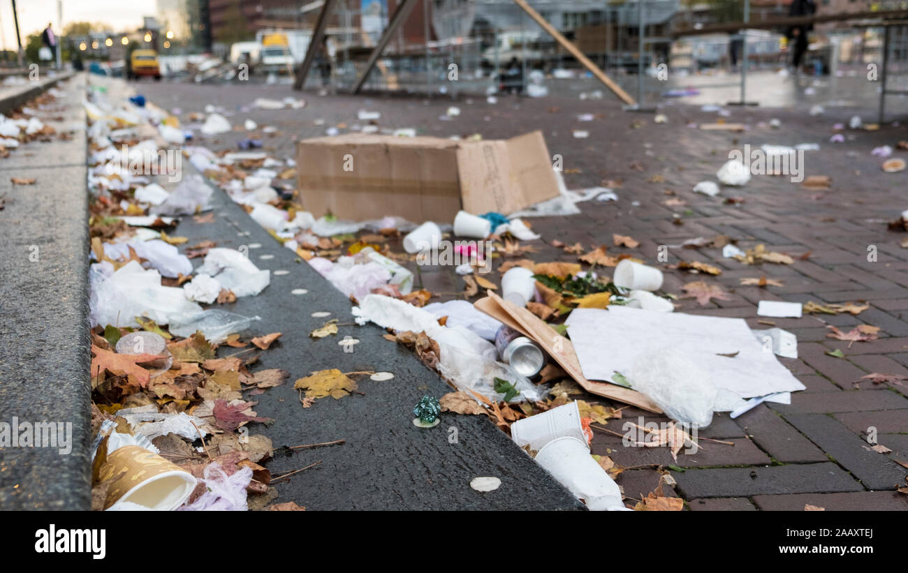Litter on the street Stock Photo - Alamy