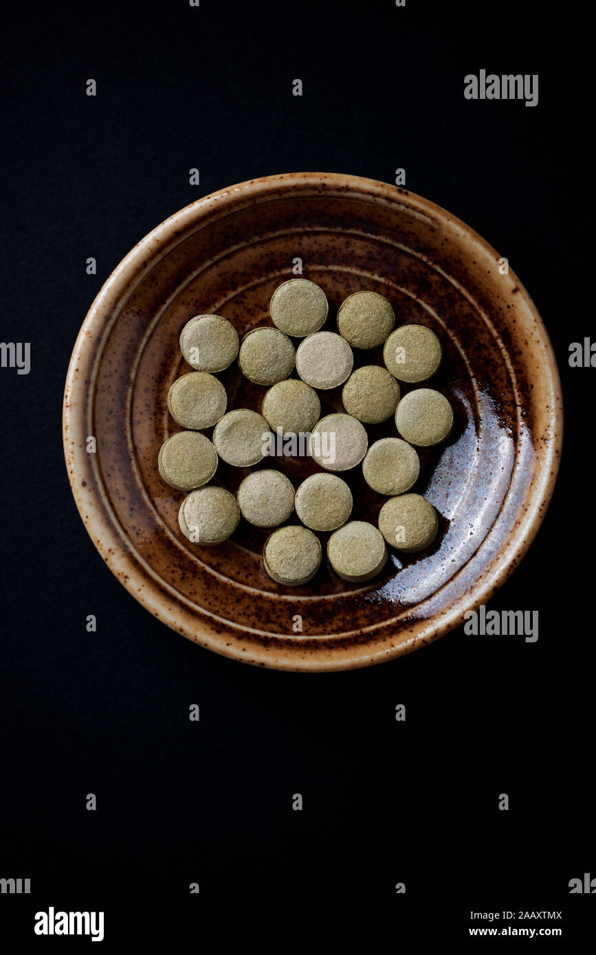 Bio Green BARLEY GRASS tablets. Concept for a healthy dietary ...