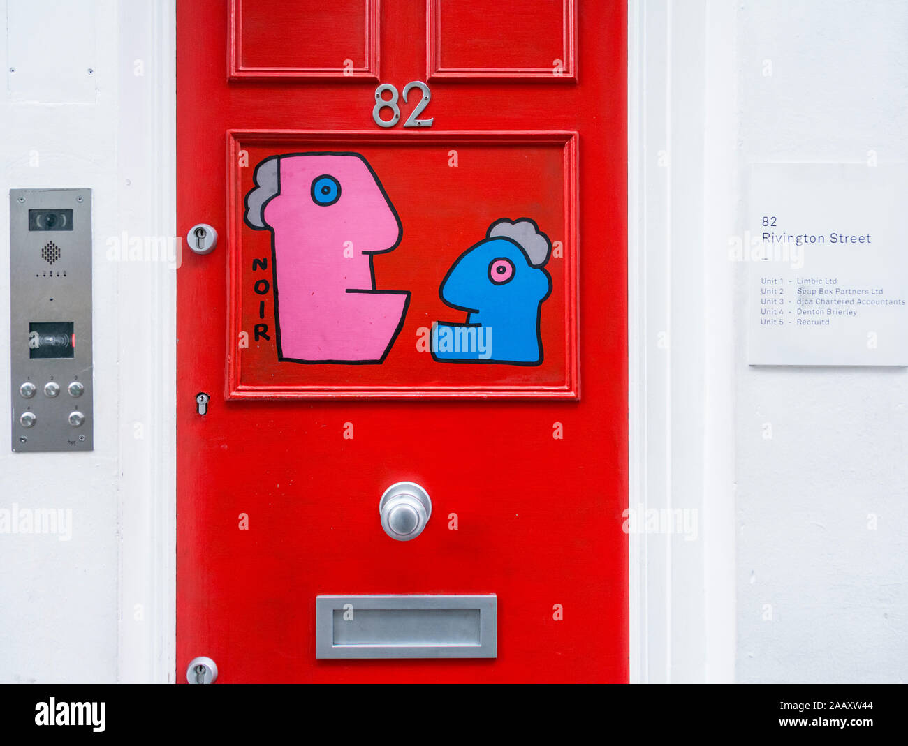 A Thierry Noir mural on a red door in Hoxton in London's East End, UK ...