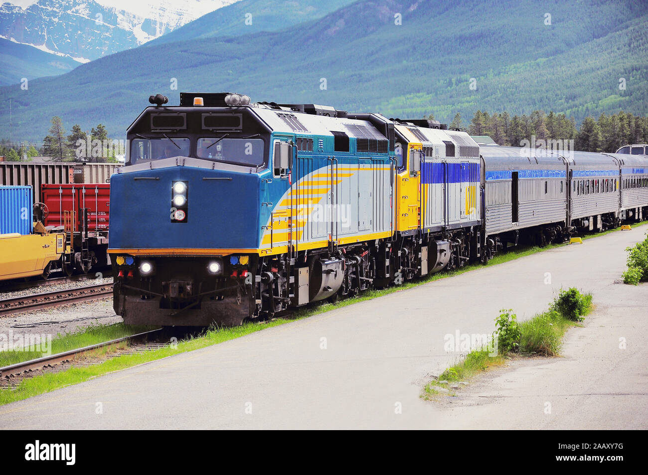 Passenger train from Vancouver stands at Jasper station platform after ...