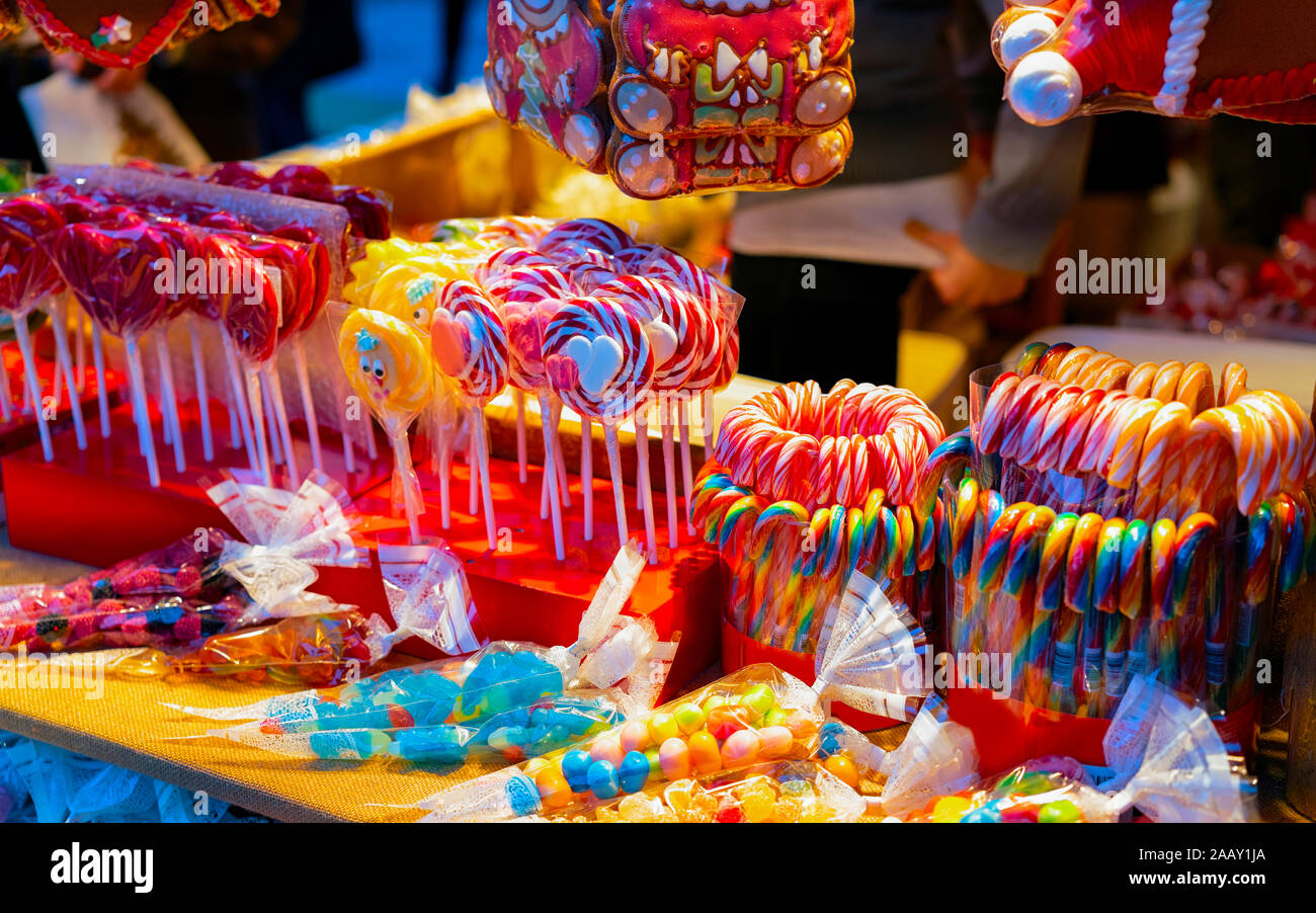 Lollipop candies in Christmas market in Germany reflex Stock Photo - Alamy