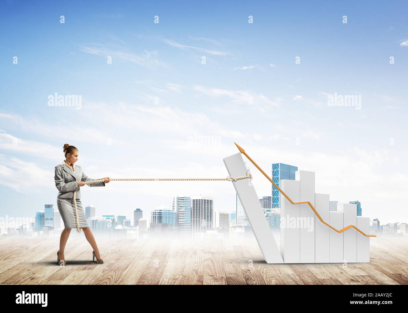 Businesswoman pulling graph with rope as concept of power and control ...