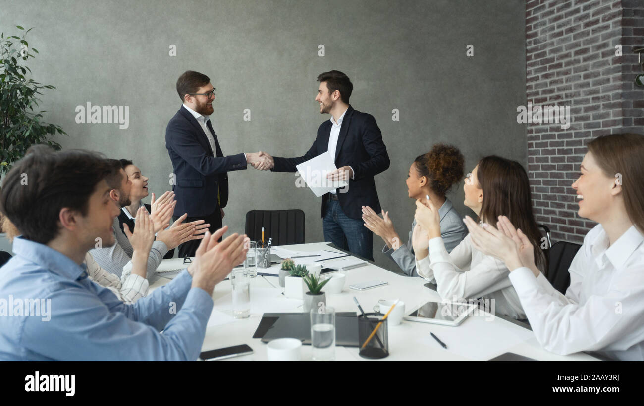 Contract conclusion. Business handshake at office corporate meeting ...