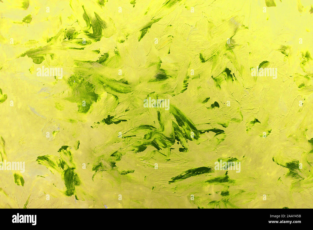 Bright abstract texture of paint on canvas, green and yellow color and ...