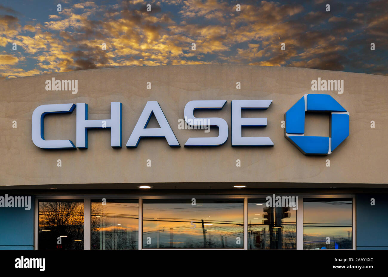 New York NY NOV 21 2019: Facade of Chase Bank with sunset the rays in ...