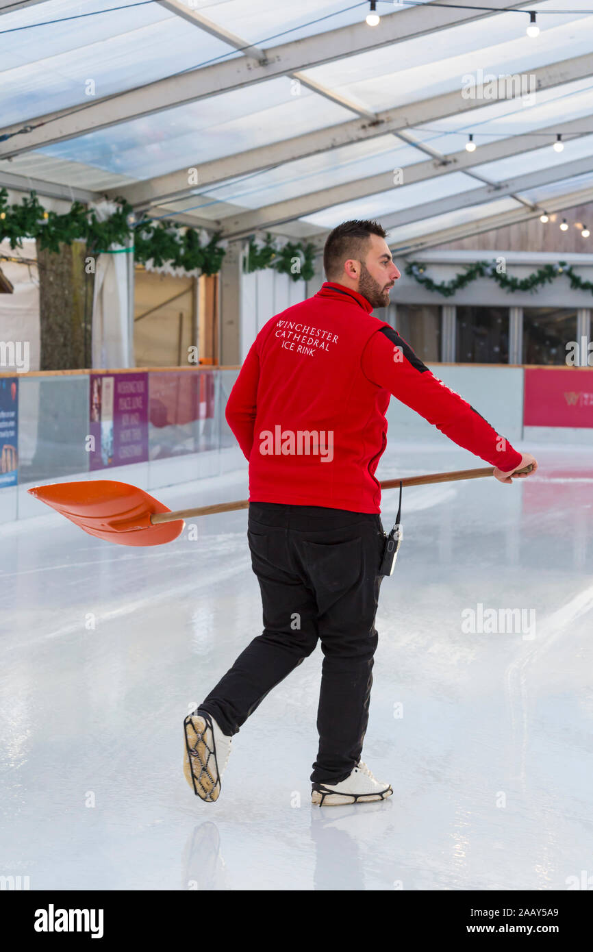 Preparing the ice skate rink at Winchester Cathedral ice skating rink ...