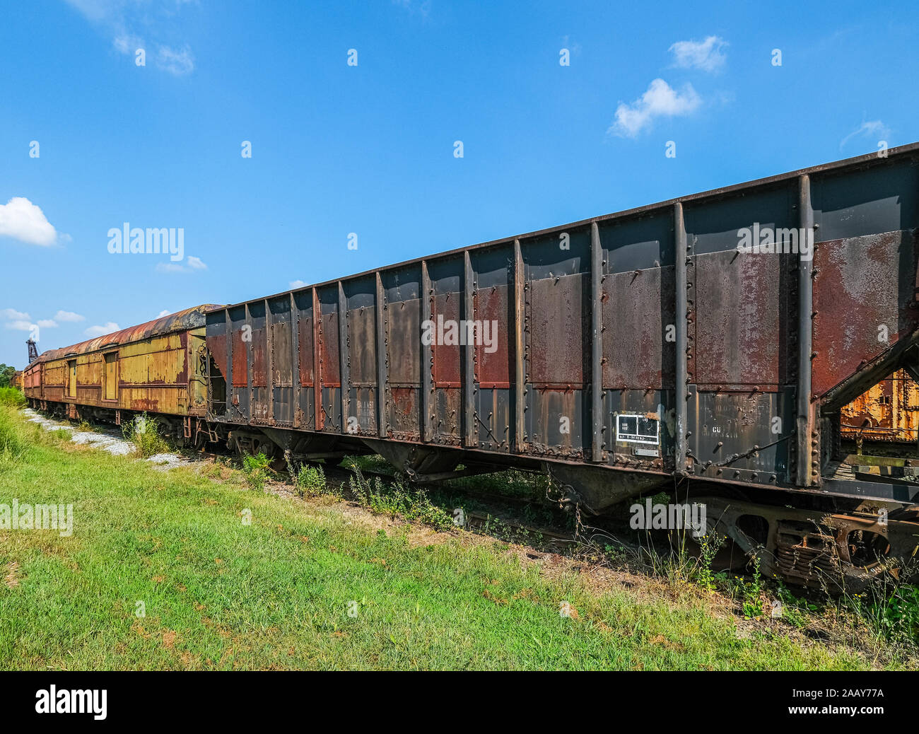 Rusty Train Cars on Track Stock Photo - Alamy
