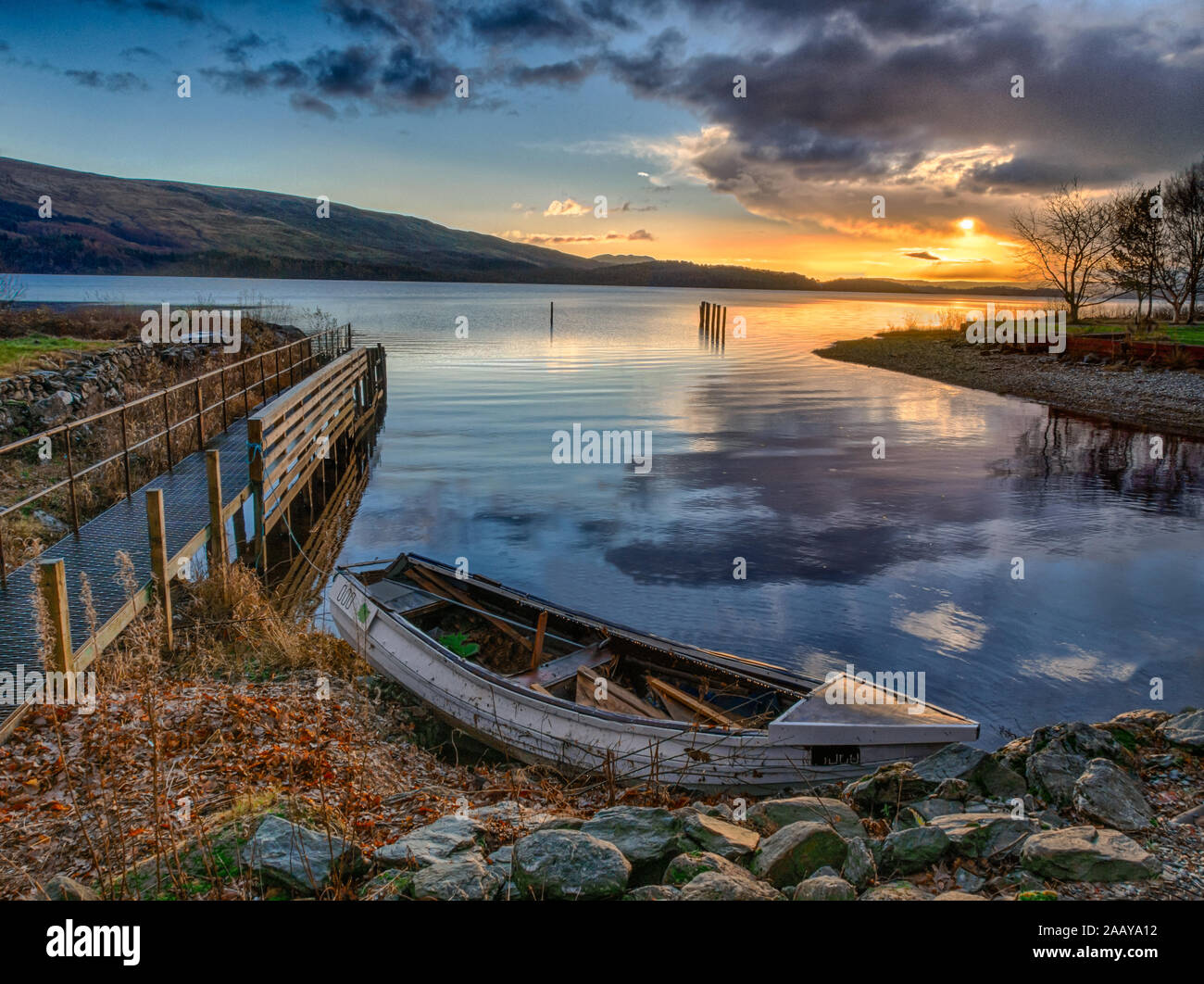 Sunrise from a small jetty near Luss on Loch Lomond Stock Photo - Alamy
