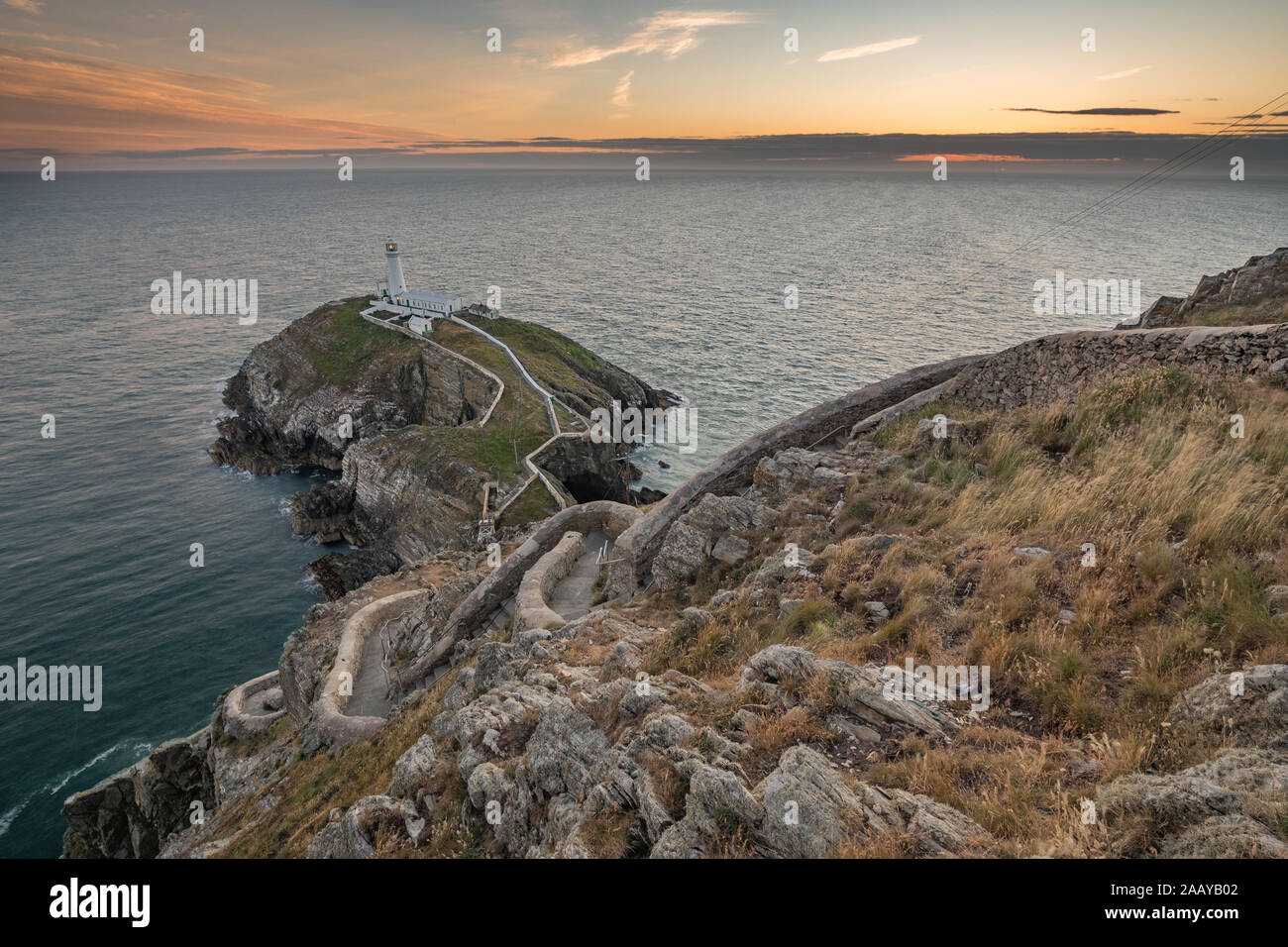 Sunset over the Iconic South Stack Lighthouse in Wales Stock Photo - Alamy