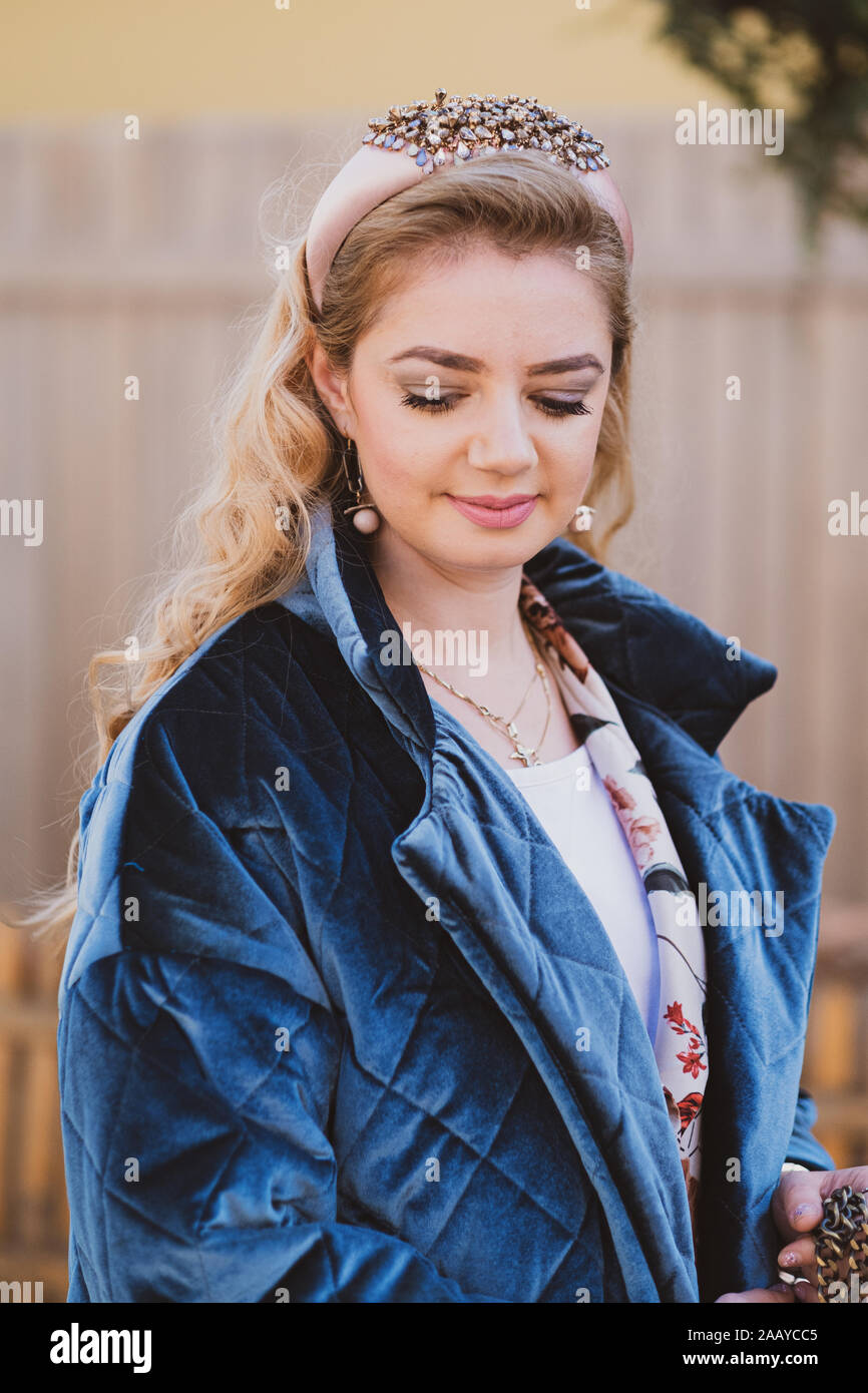 Outdoor Close Up Portrait Of A Woman Wearing Stylish Headband Posing In