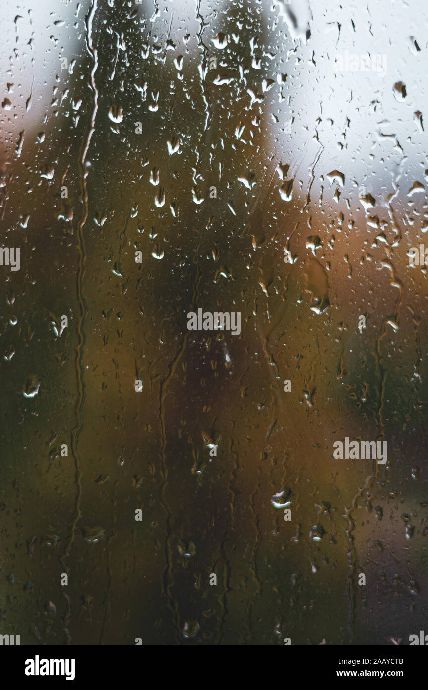 rain running down windowpane ,abstract background ,rainy weekend Stock Photo - Alamy