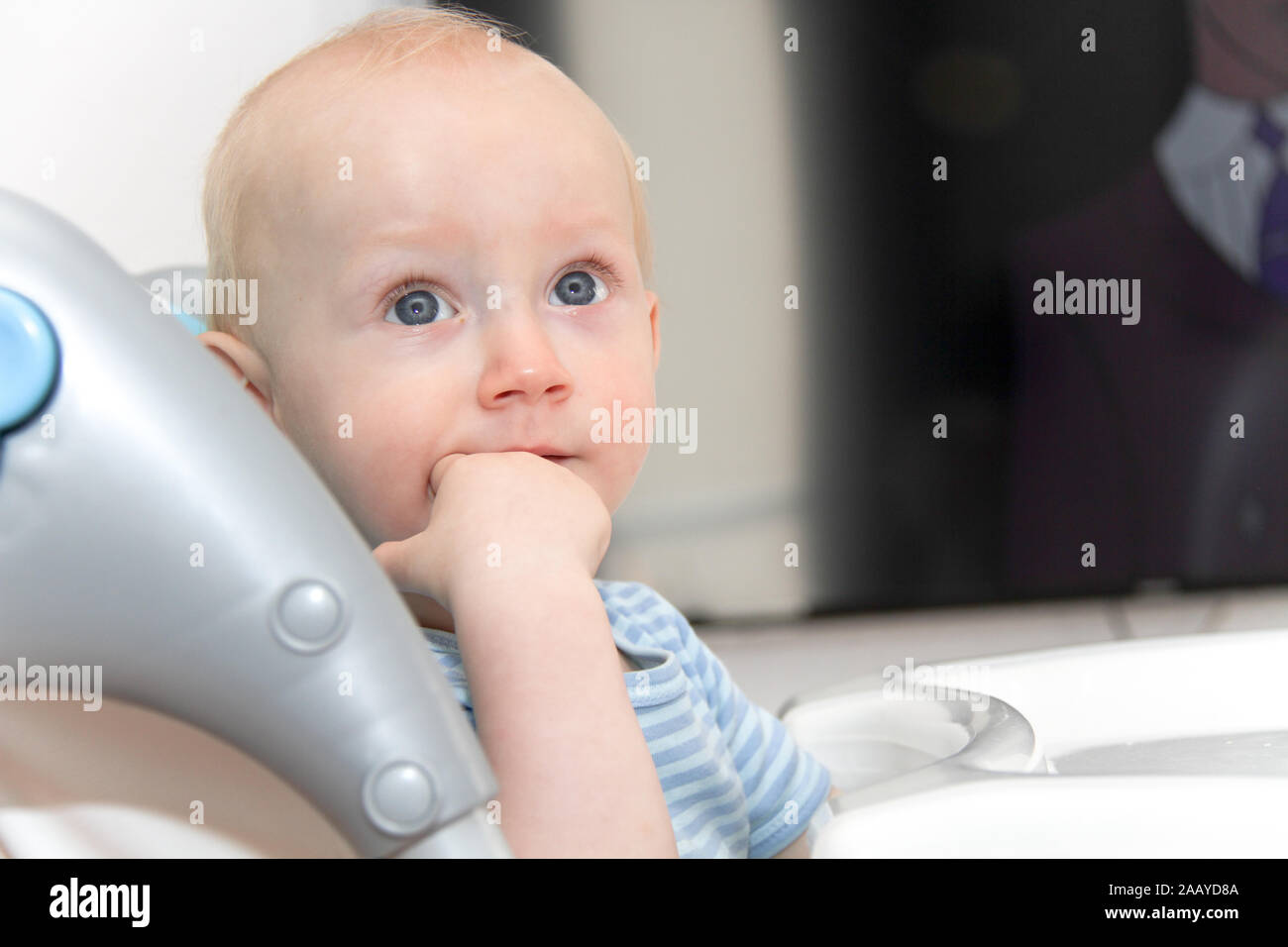 Photo of the One year Baby watching cartoons on TV and playing Stock ...