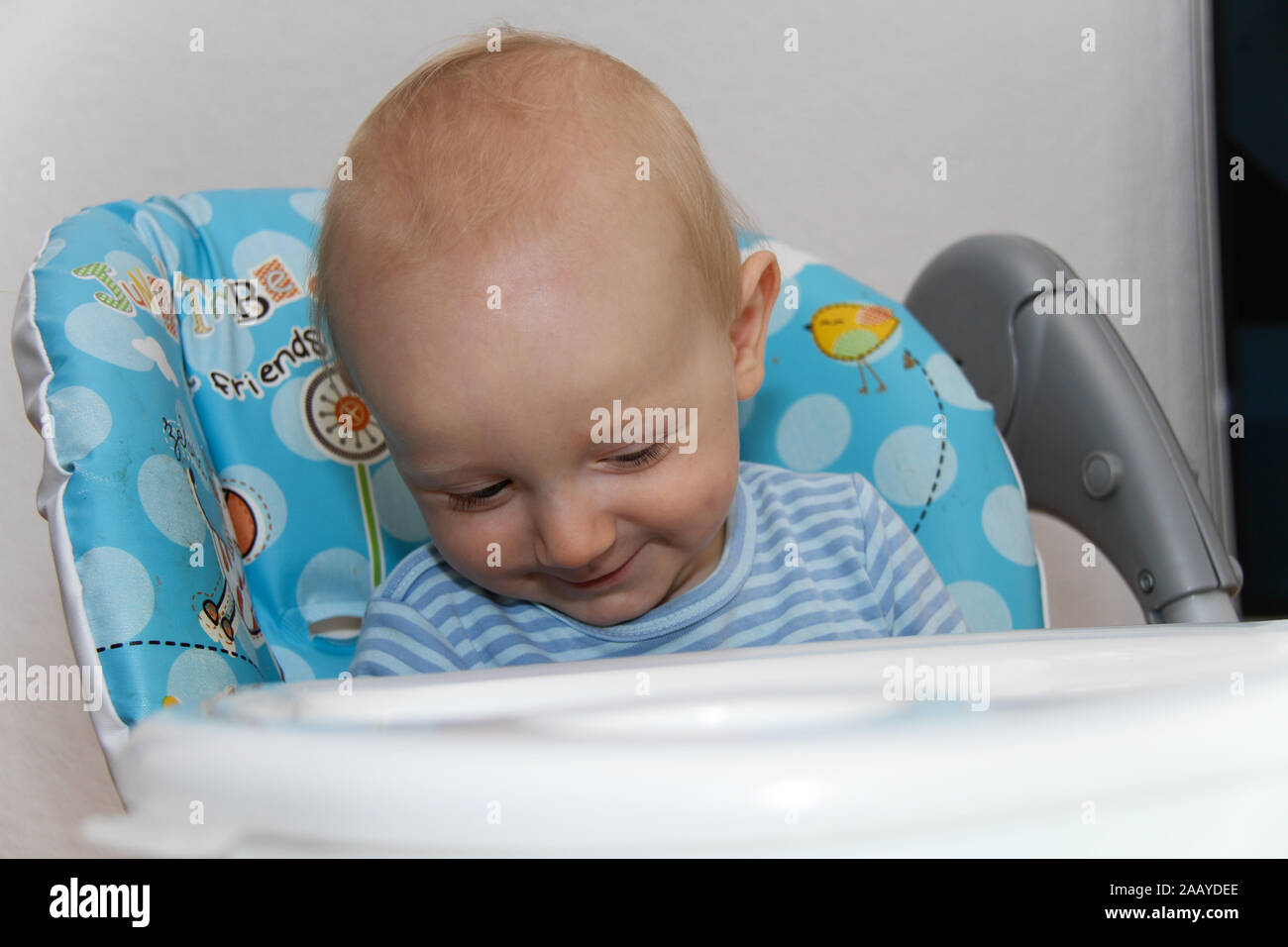 Photo of the One year Baby watching cartoons on TV and playing Stock ...