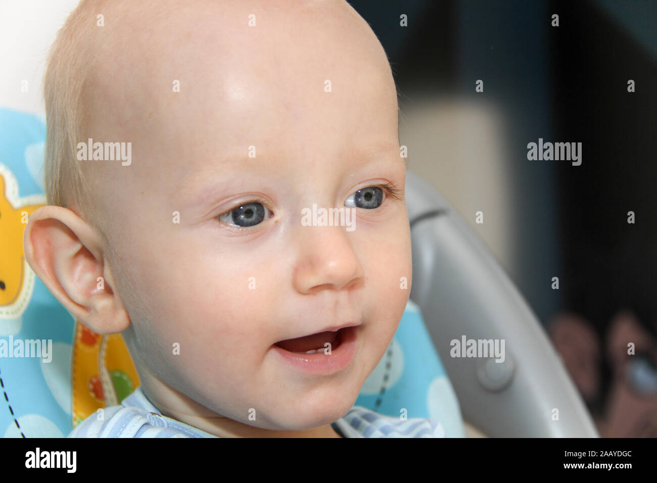Photo of the One year Baby watching cartoons on TV and playing Stock ...