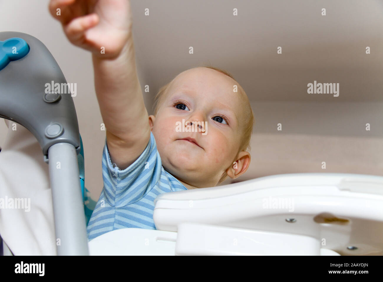 Photo of the One year Baby watching cartoons on TV and playing Stock ...