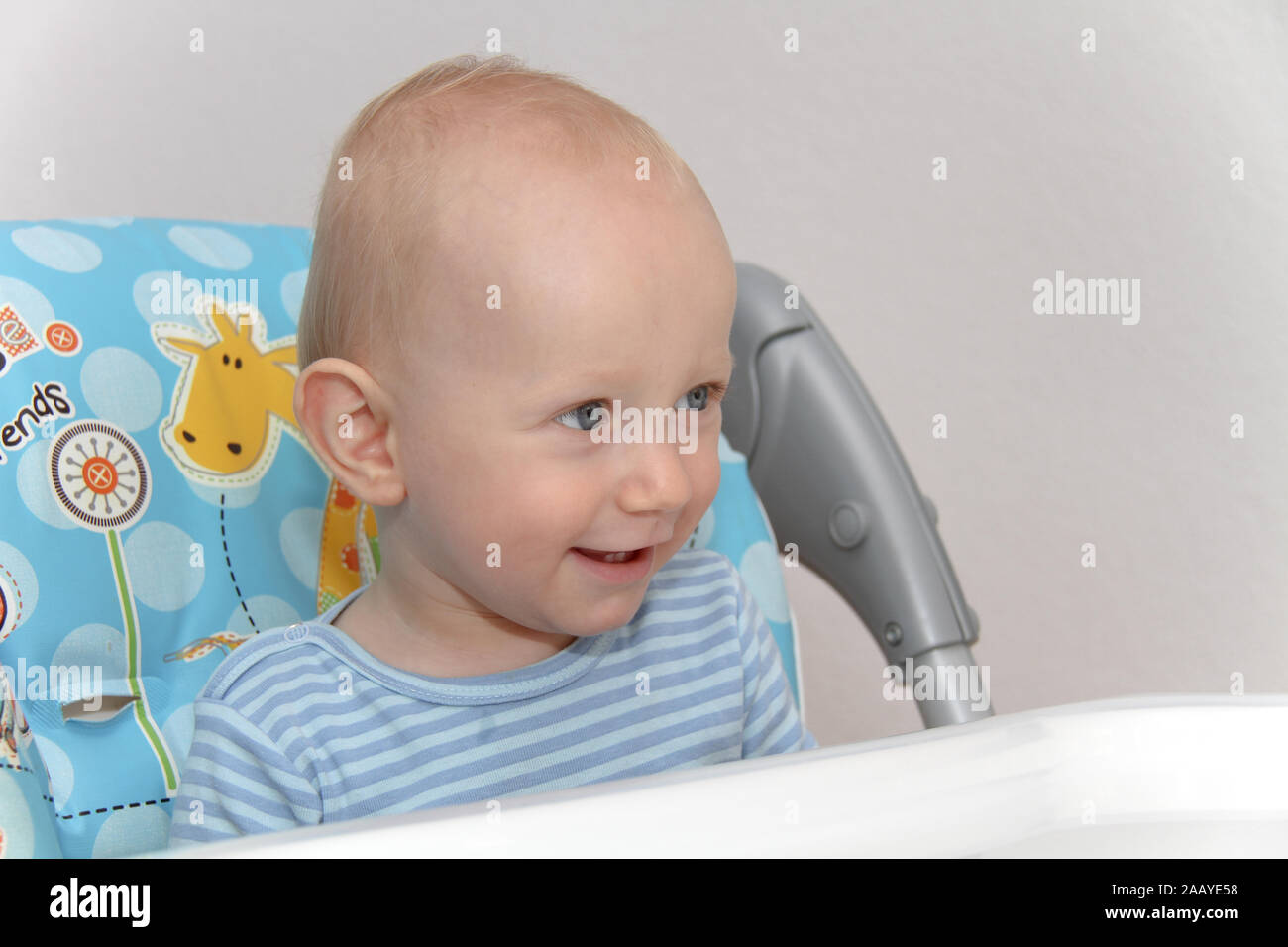 Photo of the One year Baby watching cartoons on TV and playing Stock ...