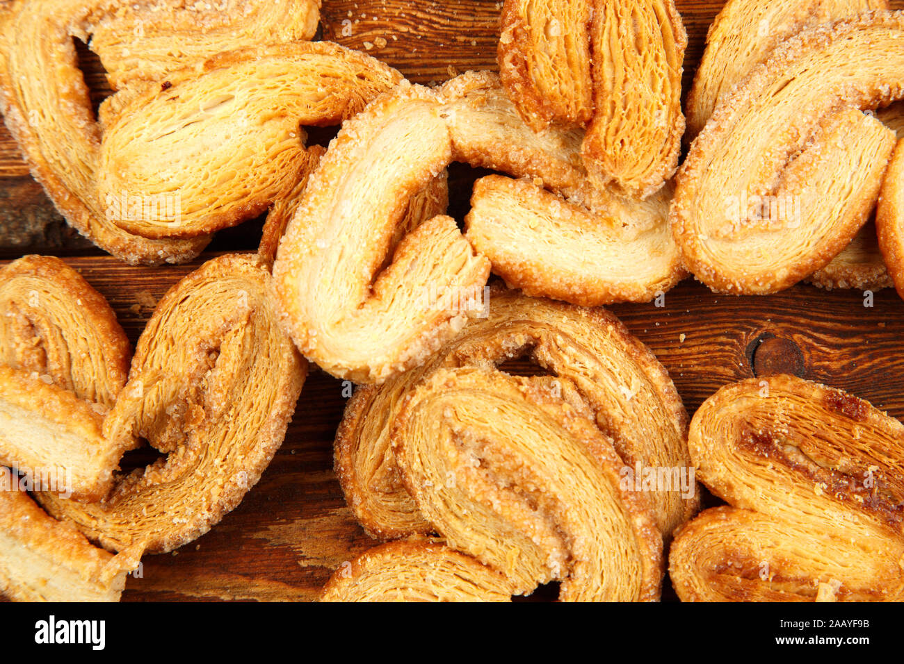 multiple layered shortbread cookies on wooden background Stock Photo ...