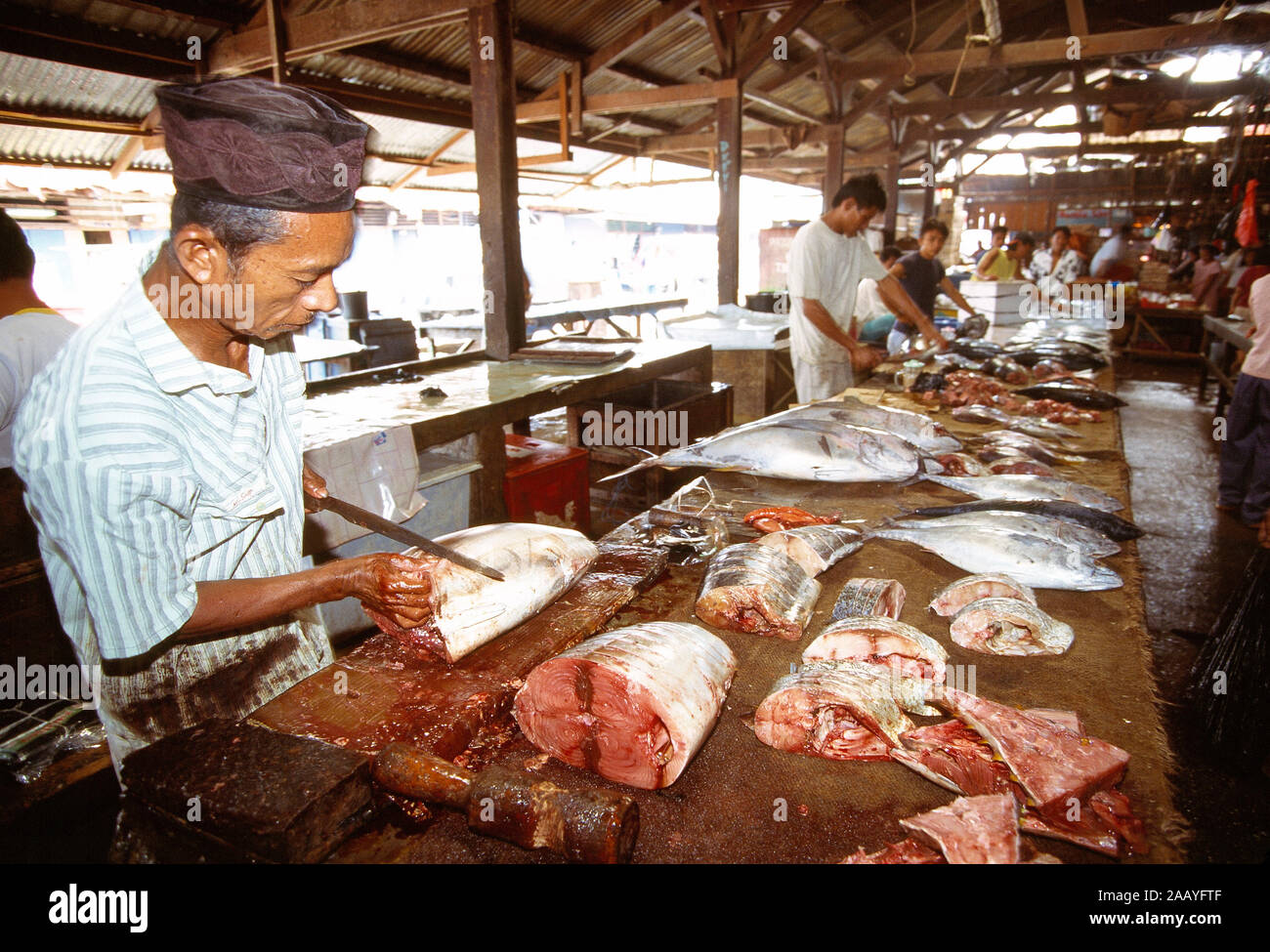 ndonesia. Sulawesi. Lake Poso region. Pendolo fish market. Fishmonger ...