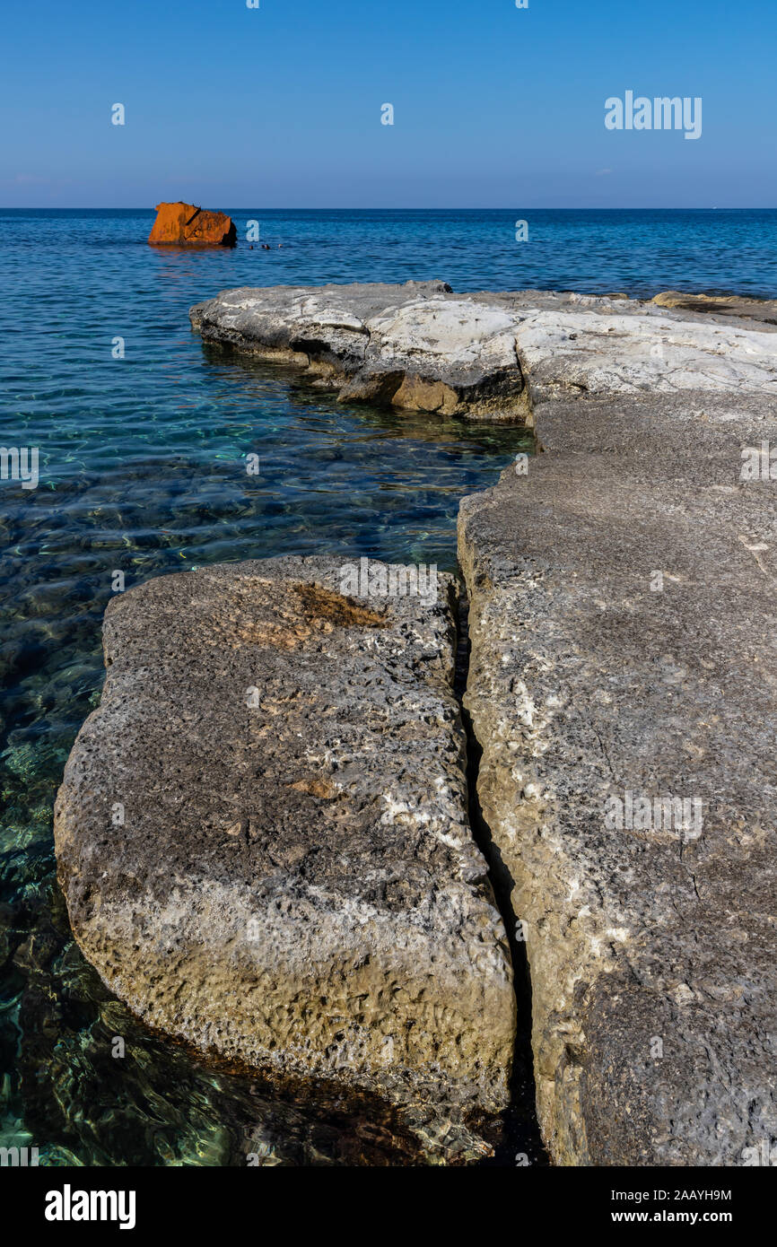 Rocks and Parts of wrecked ship in Sarakiniko beach, Milos, Greece ...