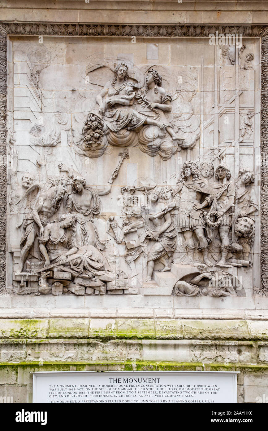 Sculpture on one side of the Monument to the Great Fire of London, a ...