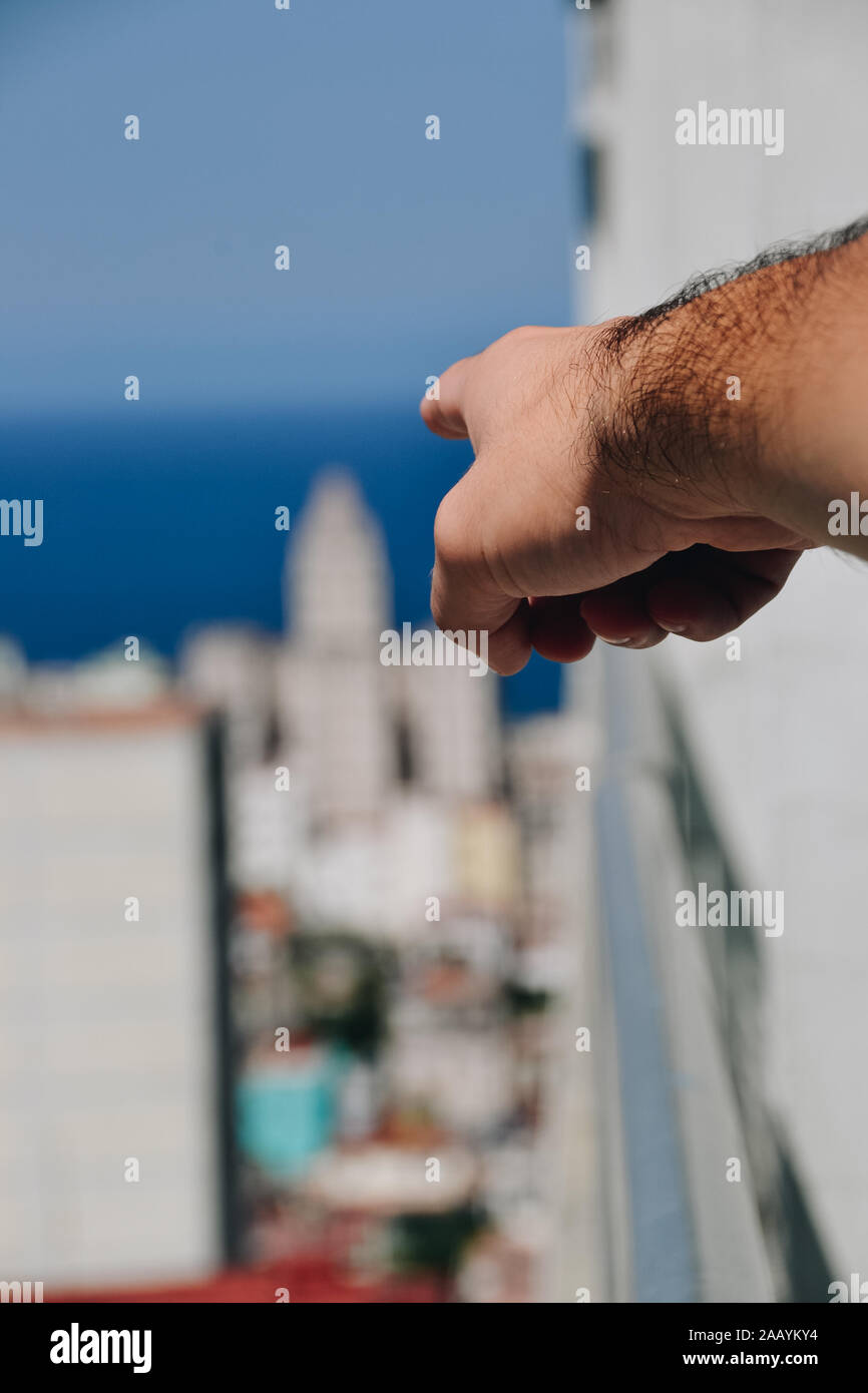 Hand pointing the Lopez Serrano building Stock Photo - Alamy