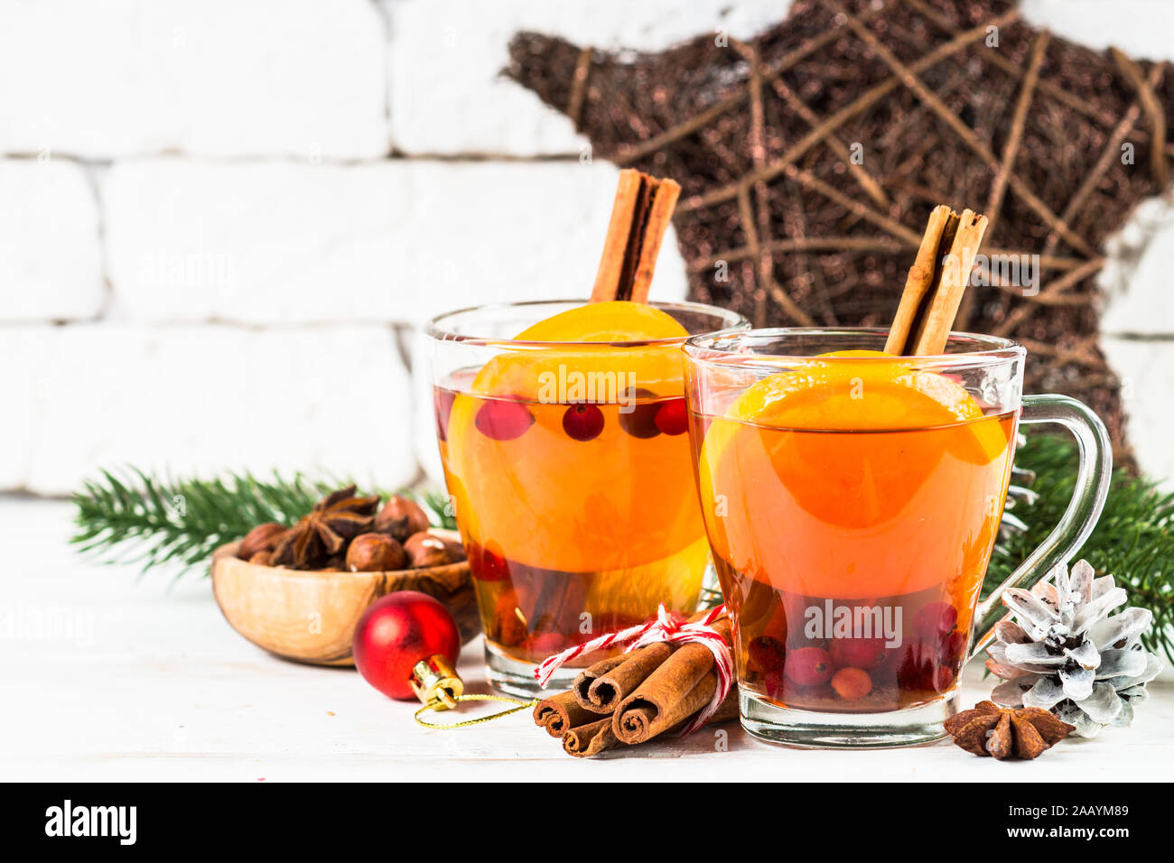 Winter hot tea with orange, cranberry and spices Stock Photo - Alamy