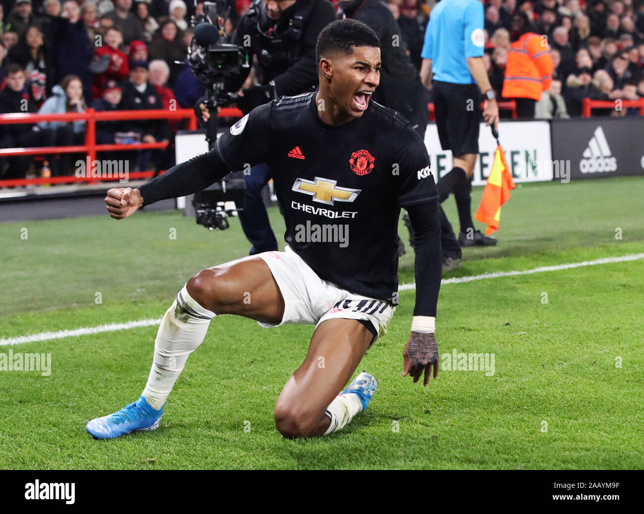 Manchester United's Marcus Rashford celebrates scoring his side's third ...