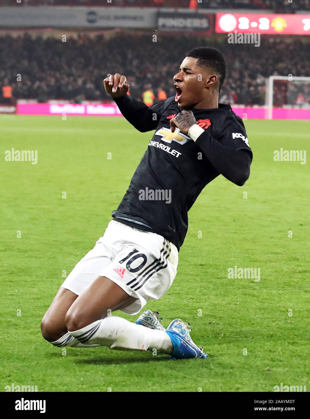 Manchester United's Marcus Rashford celebrates scoring his side's third ...