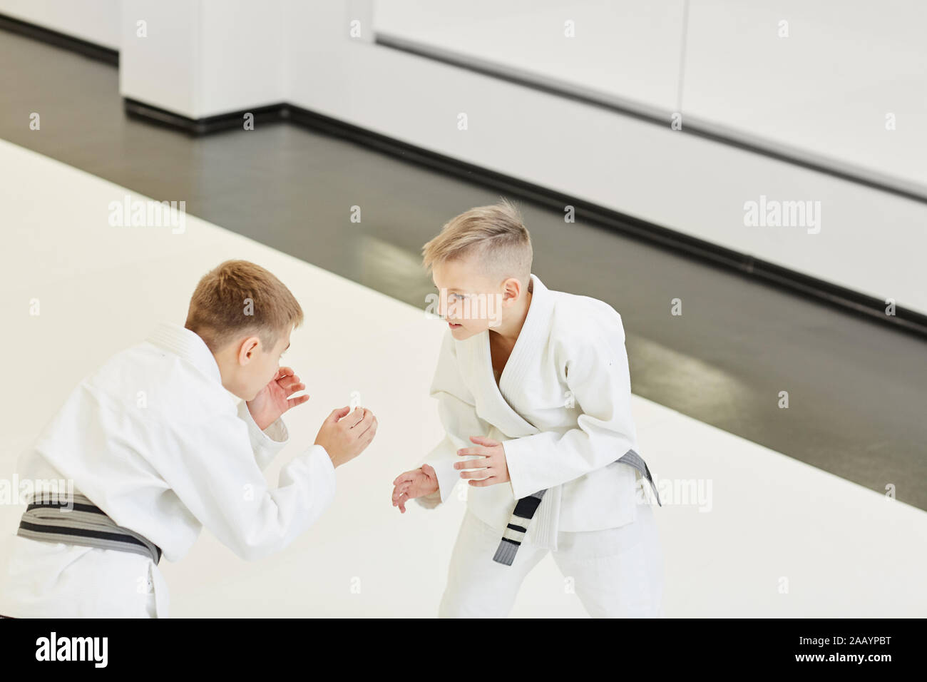 Two people standing opposite each other hi-res stock photography and ...