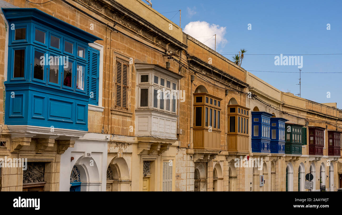 colorful balcony windows on malta island Stock Photo - Alamy