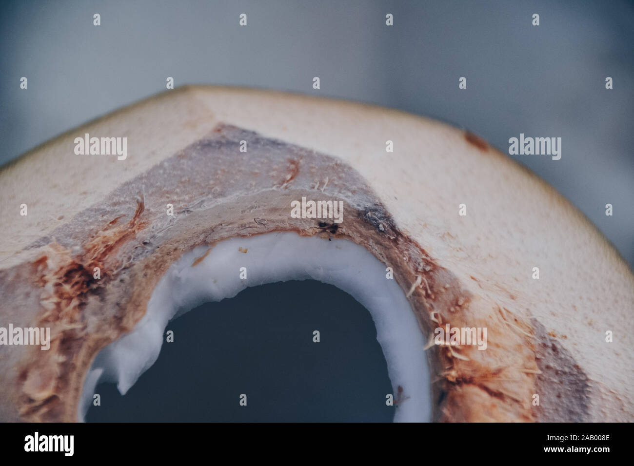 Open coconut ready to drink Stock Photo - Alamy