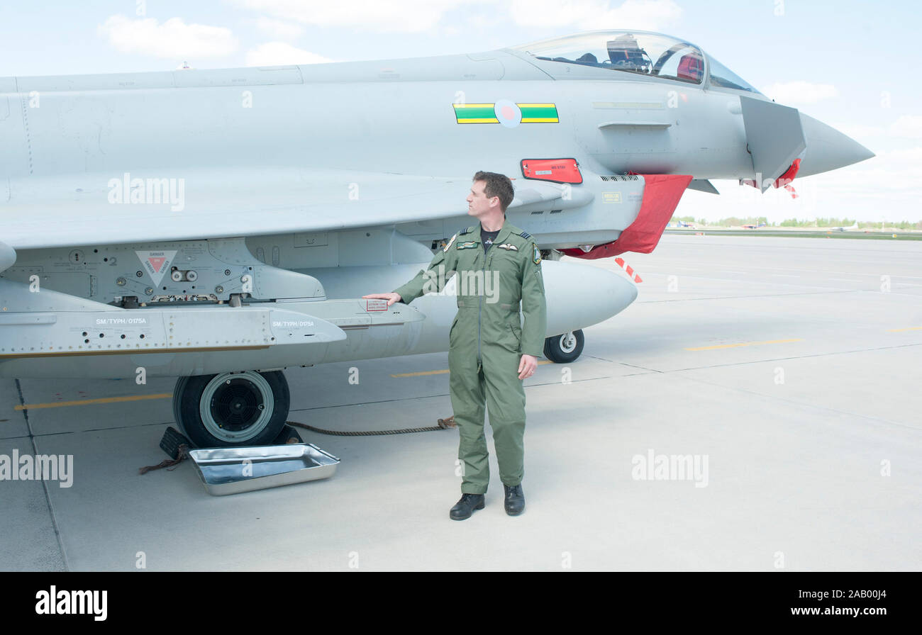 A British pilot scrambling to board a typhoon Aircraft at the Siauliai ...