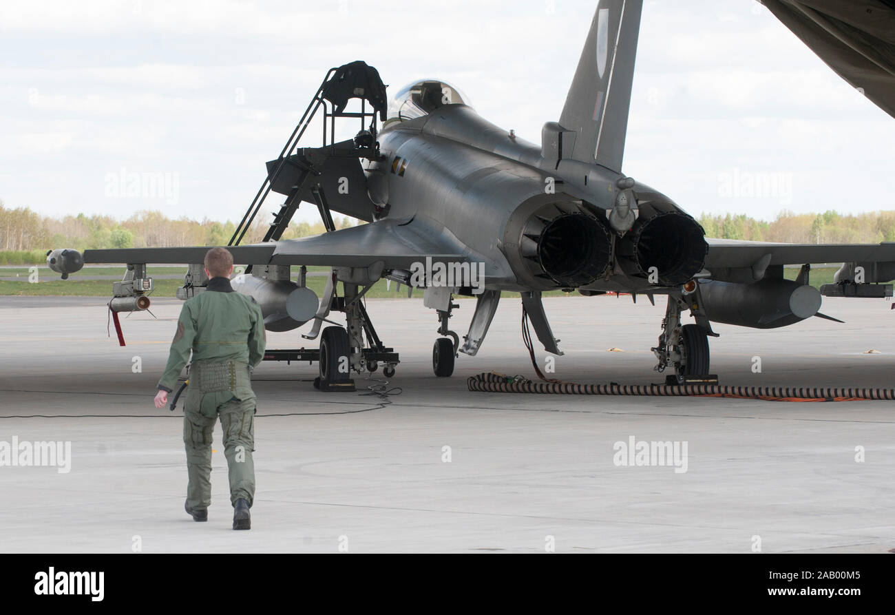 A British pilot scrambling to board a typhoon Aircraft at the Siauliai ...
