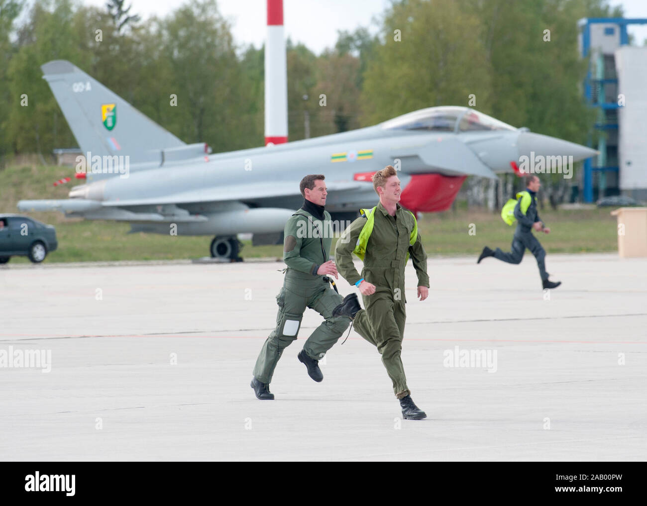 A British pilot scrambling to board a typhoon Aircraft at the Siauliai ...