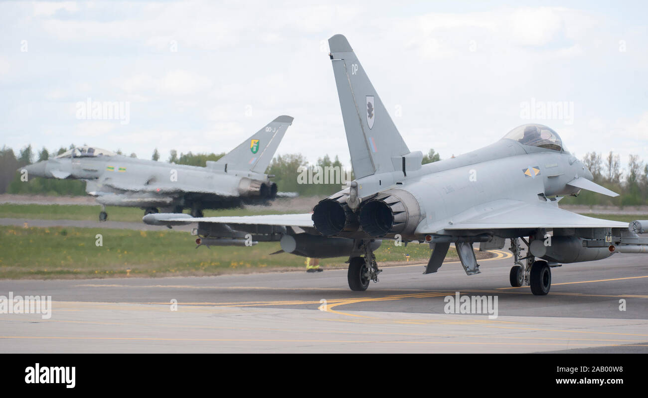 A British pilot scrambling to board a typhoon Aircraft at the Siauliai ...