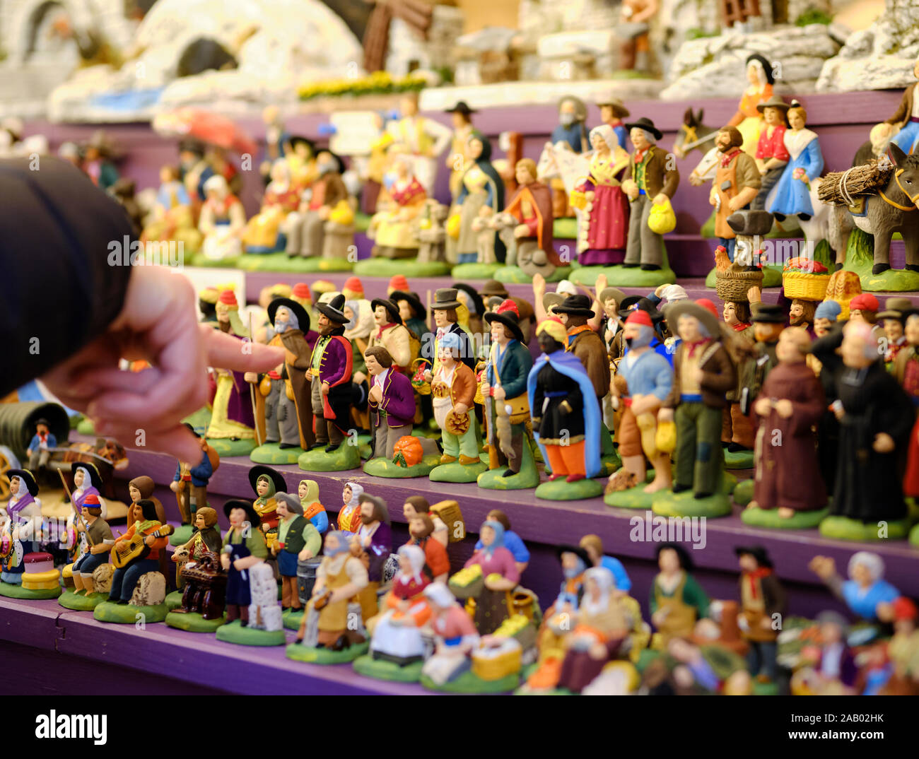 Finger pointing at Large display of Santon figurines for sale in a ...