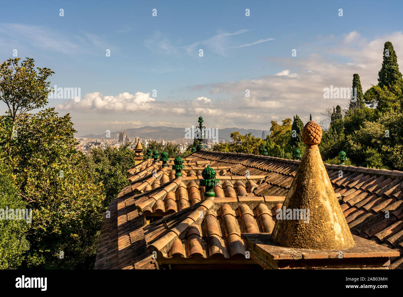 view on Barcelona city and a rooftop of a church in a parc Stock Photo ...