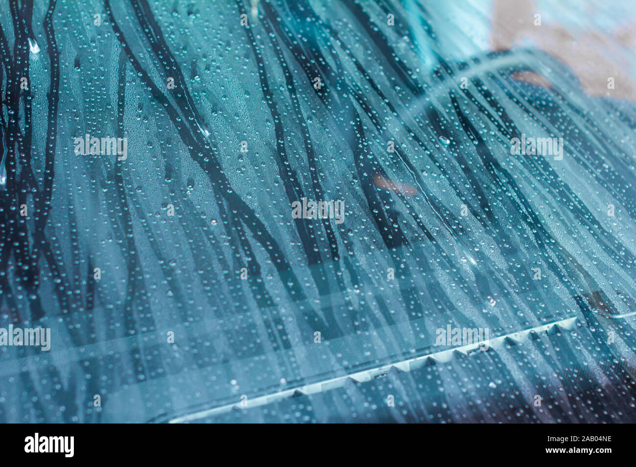 Drops of water on the car glass window after rain Stock Photo - Alamy